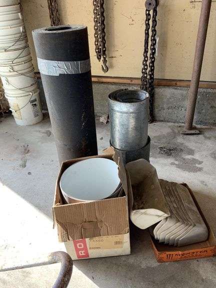 Stove pipe, tar paper, elevator cups - Legacy Auction Company