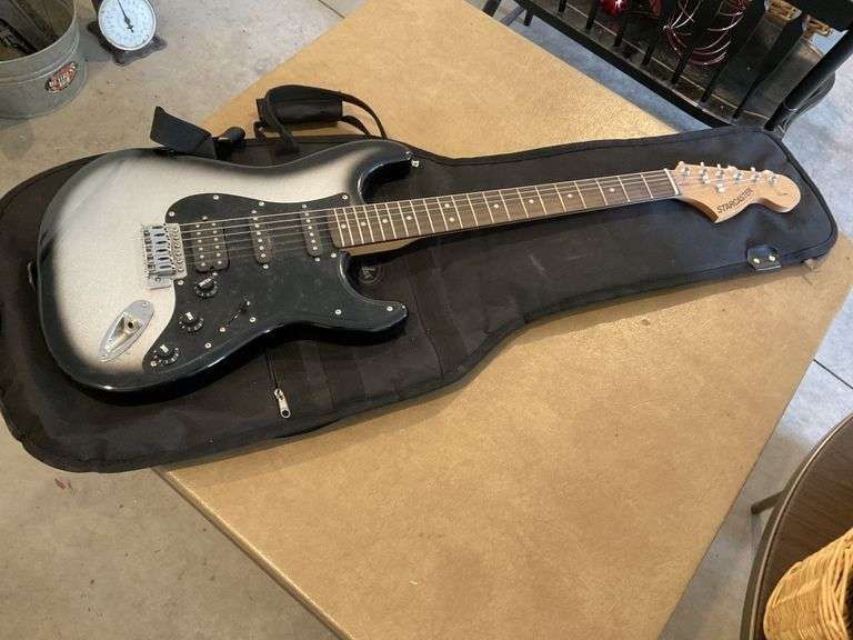 Fender start caster guitar And case - Legacy Auction Company