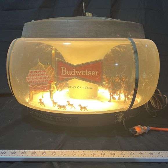 Round Budweiser Hitch carousel hanging motion - Legacy Auction Company