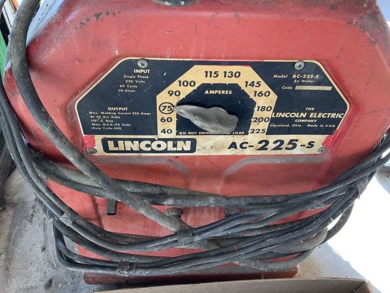 Lincoln stick welder, face shields & rods - Legacy Auction Company