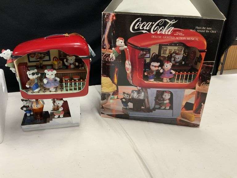 Coca Cola action musical - Legacy Auction Company