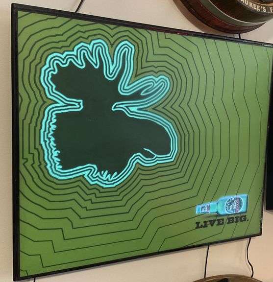 The Moosehead “live big” motion sign - Legacy Auction Company