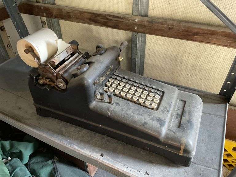 Burroughs adding machine - Legacy Auction Company