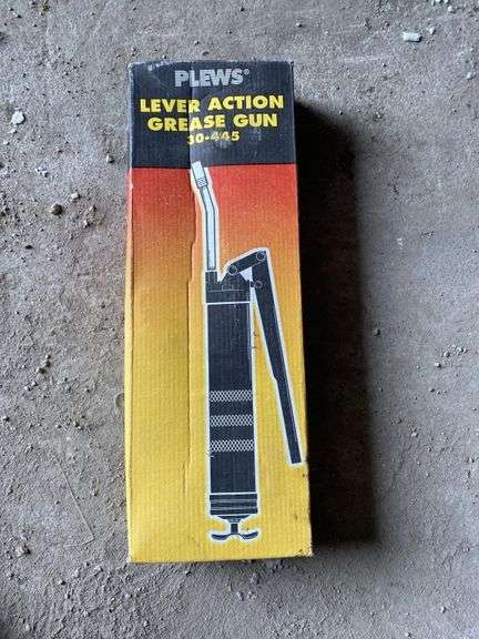 New plews grease gun - Legacy Auction Company
