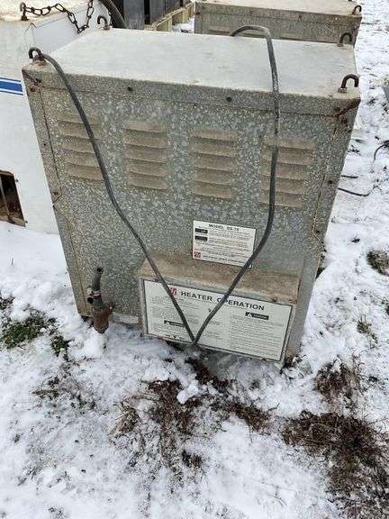 Hired hand heater model SS -75 - Legacy Auction Company