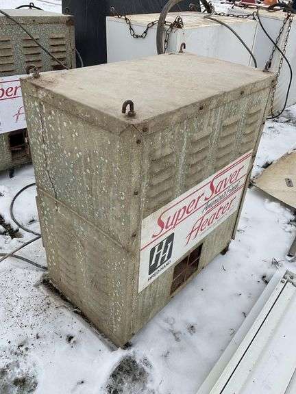 Hired hand heater model SS -75 - Legacy Auction Company