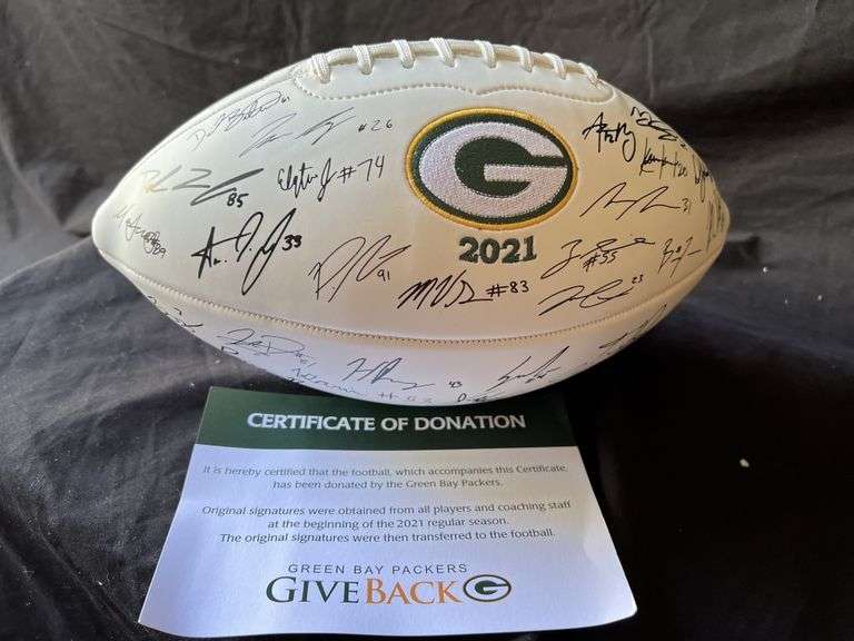 Facsimile Autographed Green Bay Packers football. - Legacy Auction Company