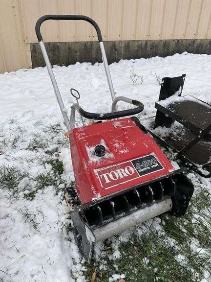 Toro S-200 electric start snowblower - Legacy Auction Company