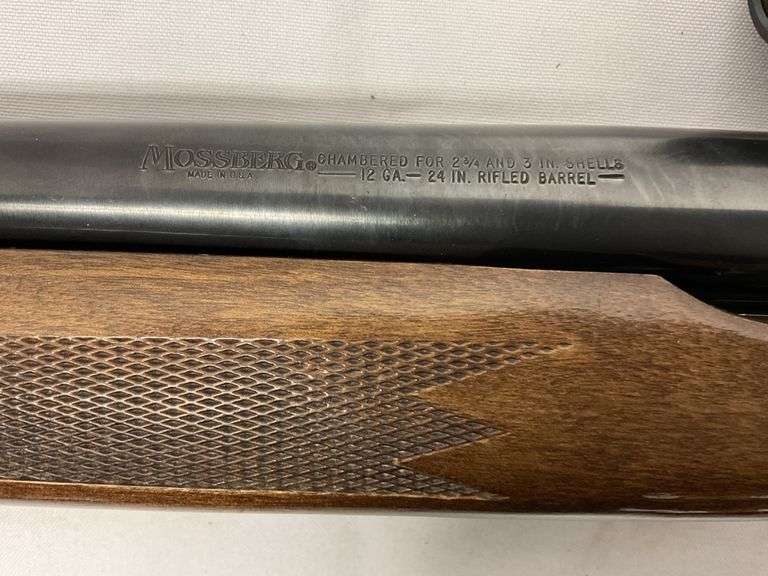 Mossberg 12 gauge 24 inch rifled barrel with - Legacy Auction Company