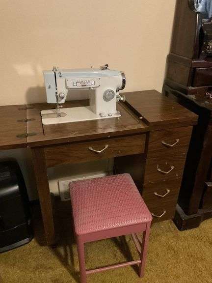 White Sewing machine, cabinet and bench - Legacy Auction Company