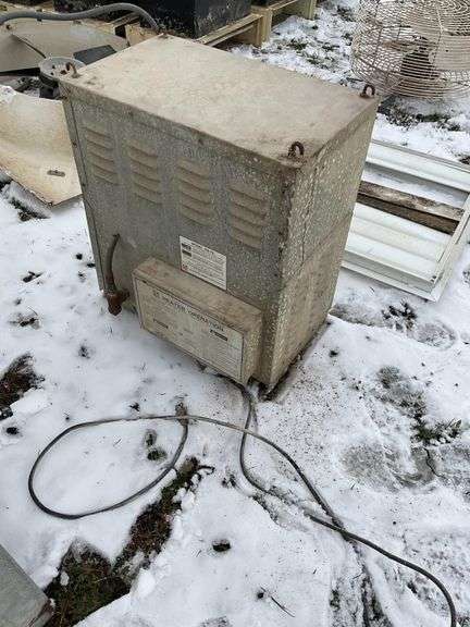 Hired hand heater model SS -75 - Legacy Auction Company