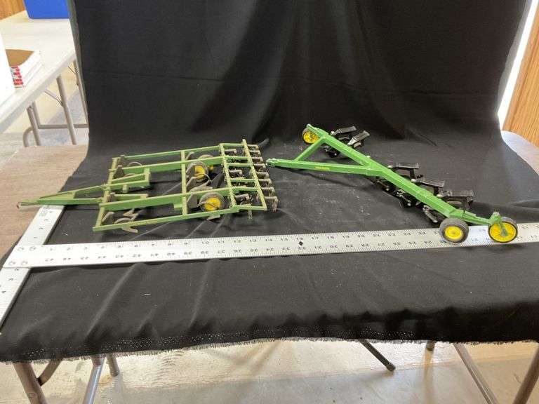 John Deere plow and 550 mulch master. Plow - Legacy Auction Company
