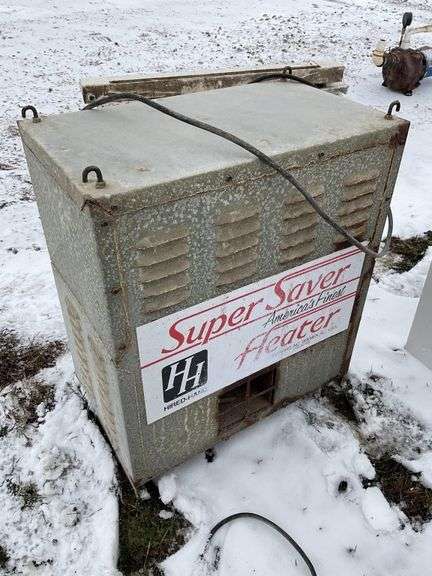 Hired hand heater model SS -75 - Legacy Auction Company