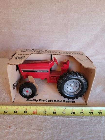 Ertl International Row Crop Tractor - Legacy Auction Company