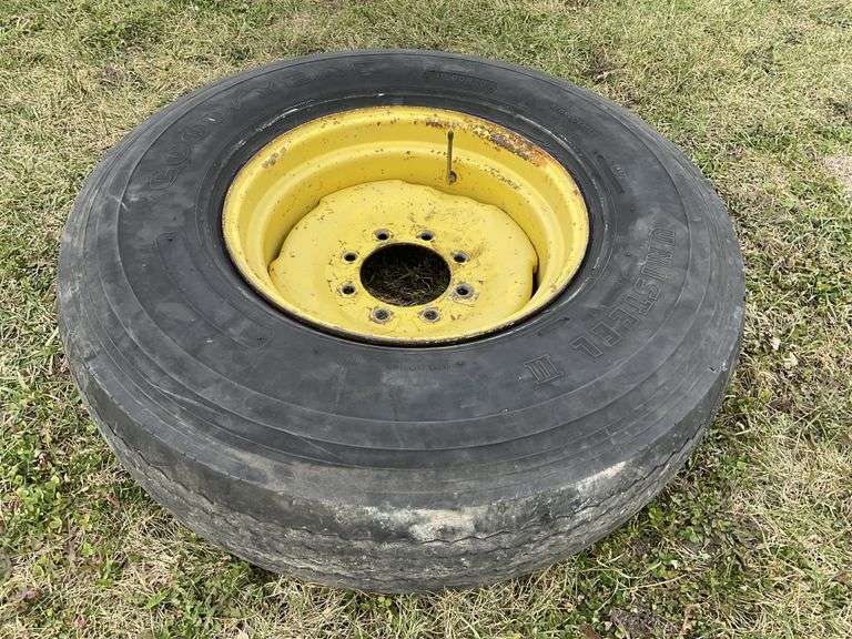 Goodyear 10.00R20 implement rim - Legacy Auction Company