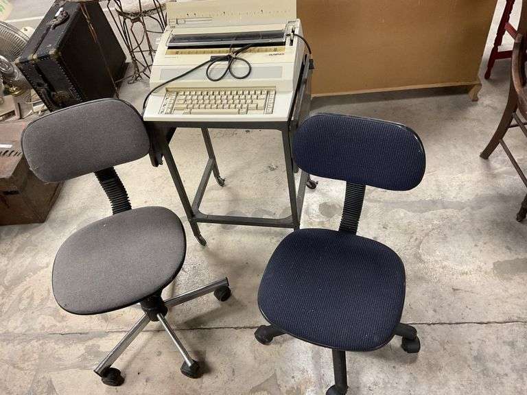 Two office chairs and stand with typewriter - Legacy Auction Company