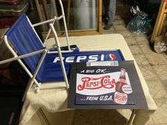 Pepsi chair and metal sign - Legacy Auction Company