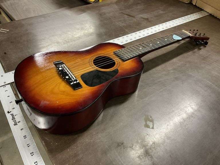 First act guitar - Legacy Auction Company