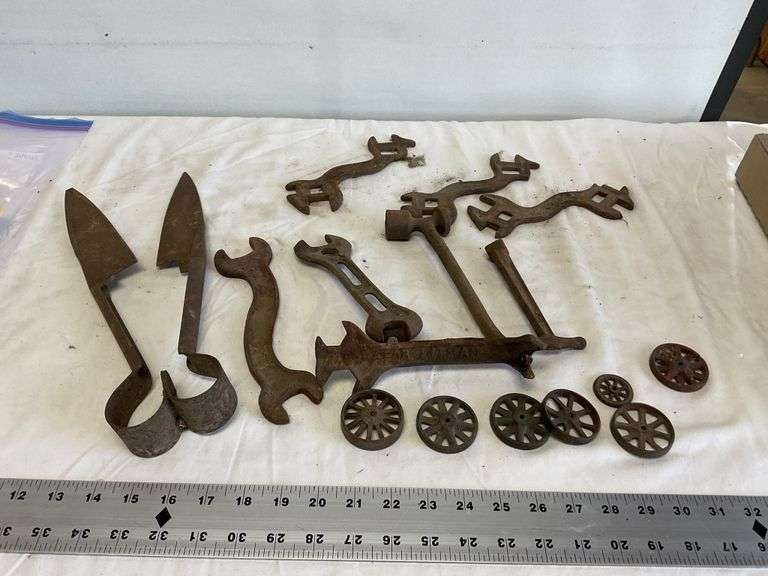Vintage tools and wagon wheels - Legacy Auction Company