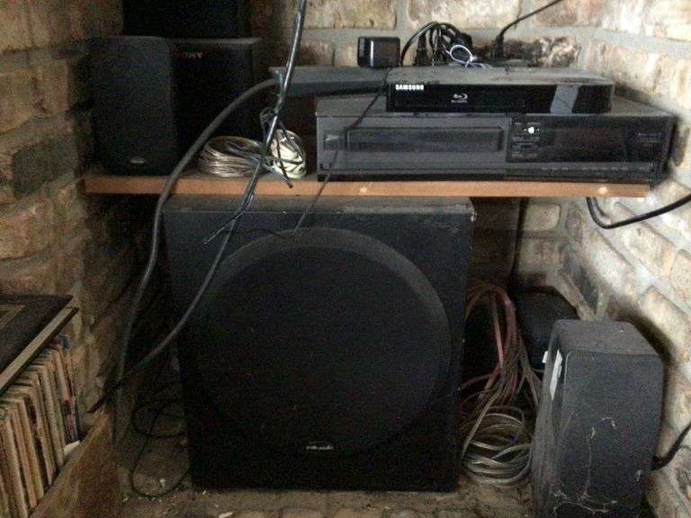 Blu-ray player, speakers, Polk audio subwoofer - Legacy Auction Company