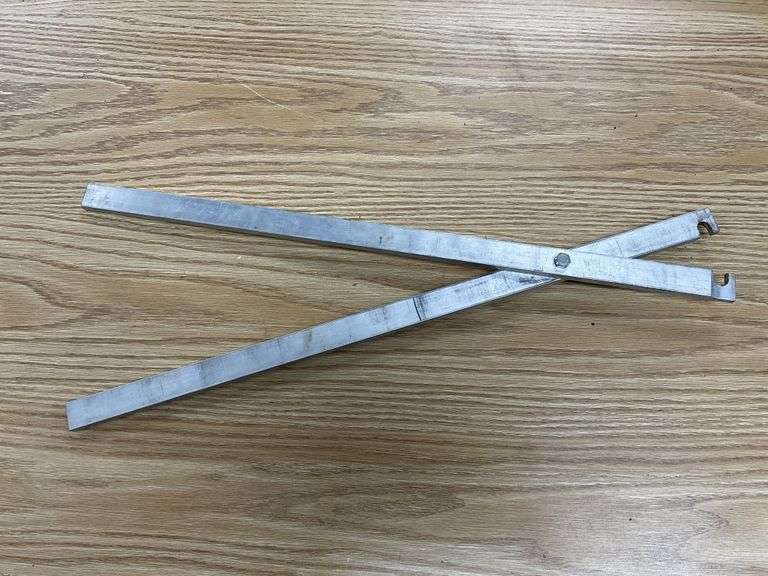 Conibear trap setter - Legacy Auction Company