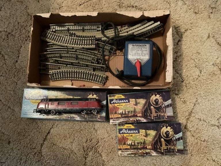 Empty boxes plus track, transformer & engine - Legacy Auction Company