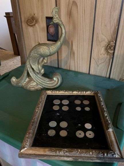 Foreign coins and bird sculpture - Legacy Auction Company