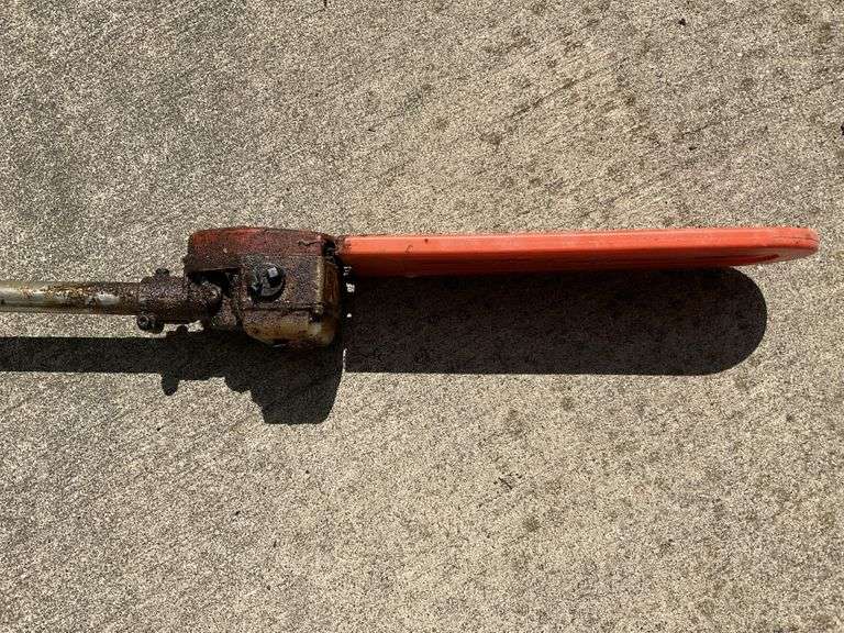 Husqvarna 325P4 chainsaw on a stick. Loose - Legacy Auction Company