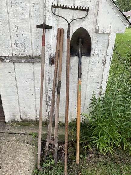 Shovel, post hole digger, rake and hoe - Legacy Auction Company