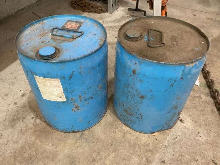 Phillips 66 cans with kerosene. Approximately 5 - Legacy Auction Company
