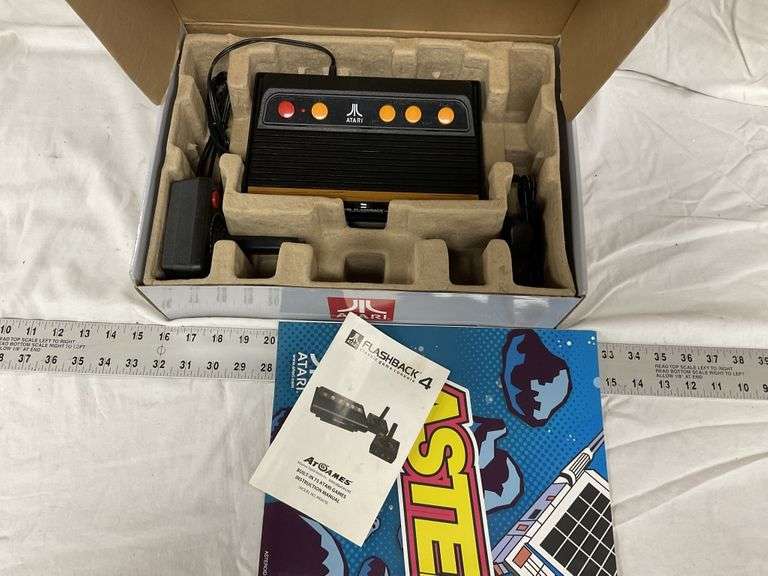 Flashback 4 classic video game console - Legacy Auction Company
