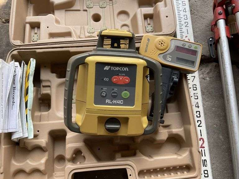 Topcon laser with receiver, tripod and Laser - Legacy Auction Company