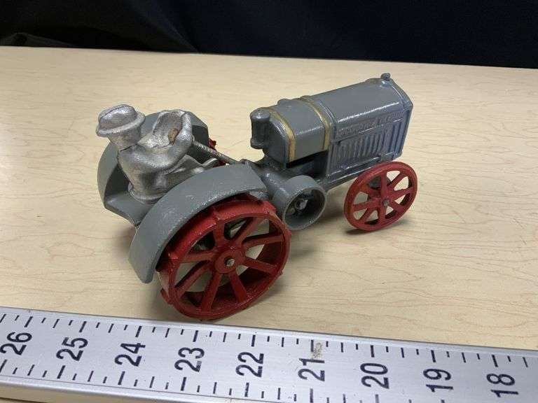 McCormick Deering cast iron tractor by Pioneer - Legacy Auction Company