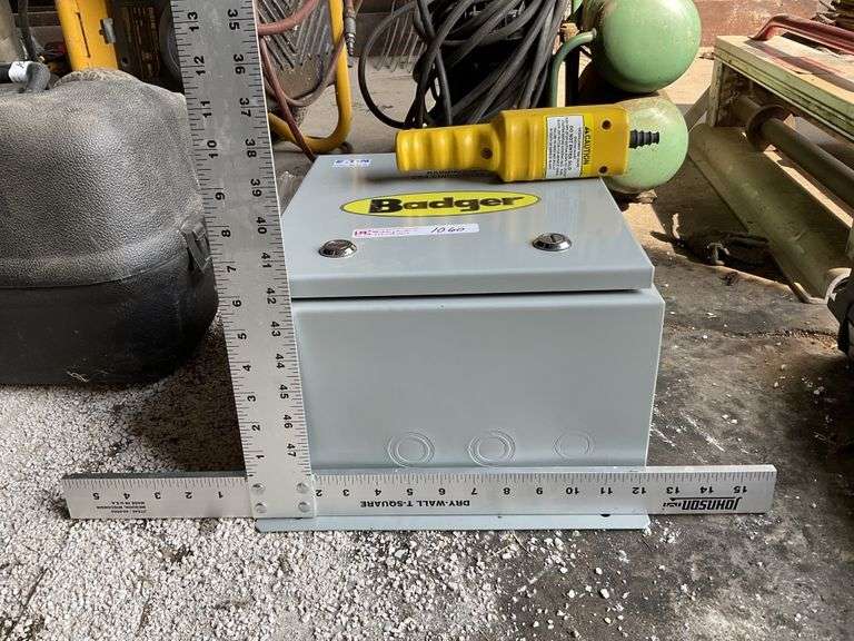 Badger silo unloader remote control - Legacy Auction Company