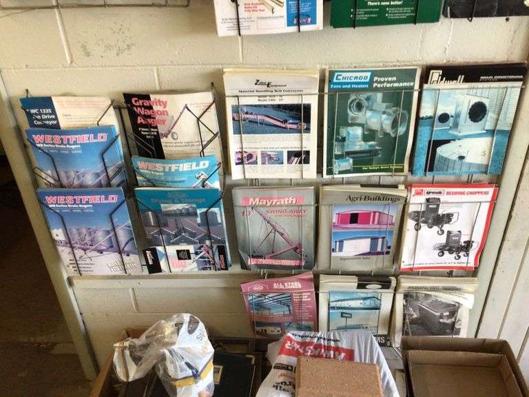 2 brochure Racks buyer removes - Legacy Auction Company