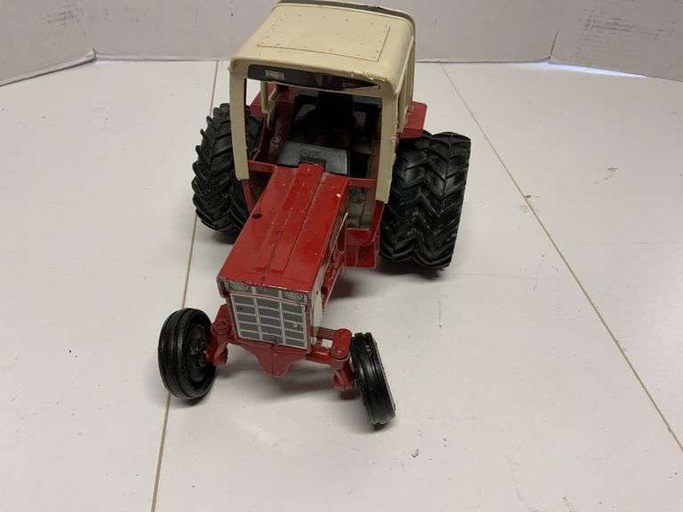 Case IH 1586 tractor, front end bent - Legacy Auction Company