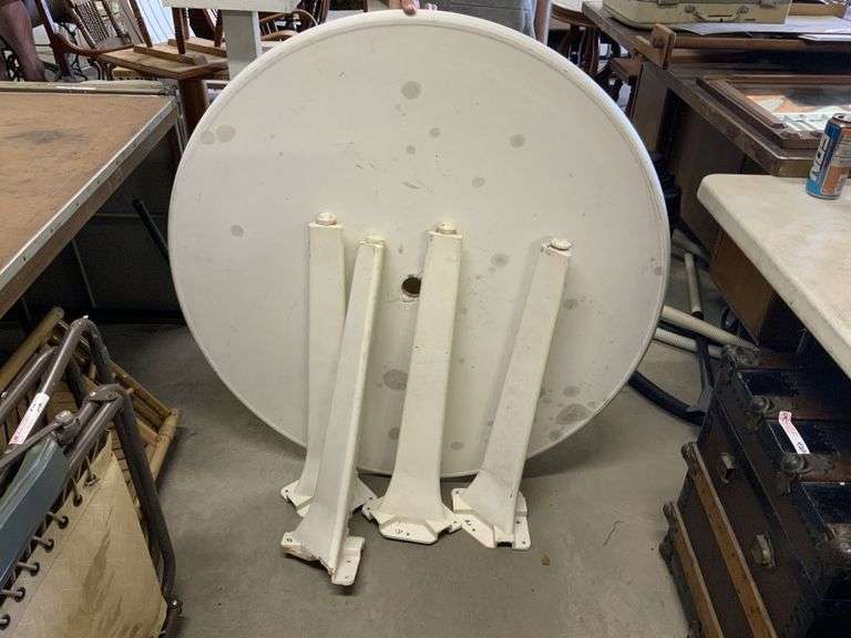 Pressed board table, legs. Missing screws - Legacy Auction Company