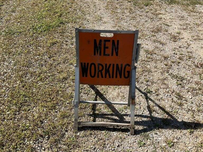 Men working sign - Legacy Auction Company