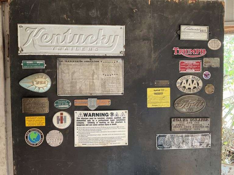 Signs and emblems on door - Legacy Auction Company