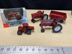 Red tractors - Legacy Auction Company