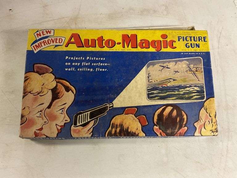 Auto magic picture gun - Legacy Auction Company