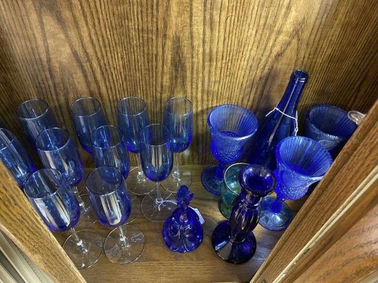 Assorted blue and clear glassware - Legacy Auction Company
