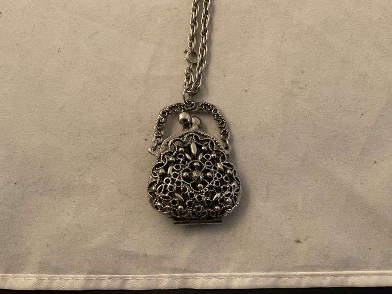 Vintage filigree coin purse necklace. - Legacy Auction Company