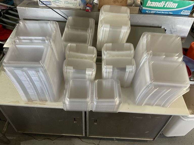 Assorted clear plastic pastry boxes - Legacy Auction Company