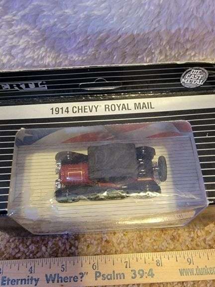 Ertl 1914 Chevy Royal Mail Car & Road Champs - Legacy Auction Company