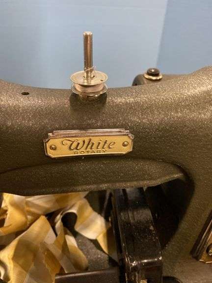 White rotary sewing machine - Legacy Auction Company