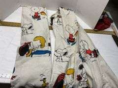 Two panels vintage Charlie Brown curtains. Need - Legacy Auction Company