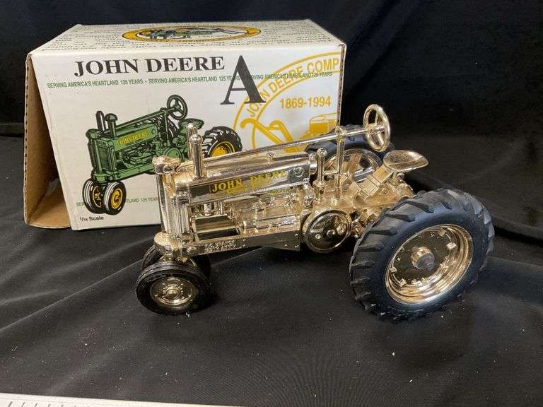 John Deere A gold tractor - Legacy Auction Company