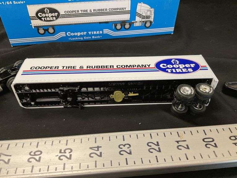 Kenworth K100E Cooper tire diecast coin bank - Legacy Auction Company