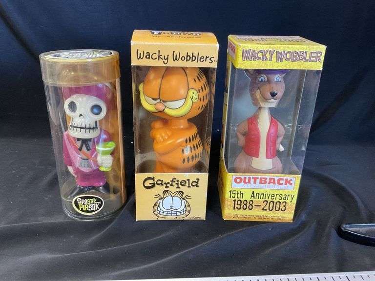 Skeleton, Garfield and Outback Steakhouse bobble - Legacy Auction Company